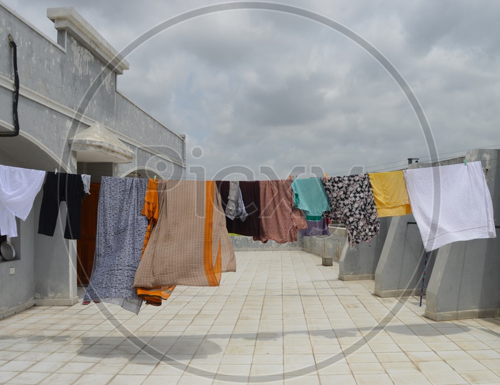 Image of Clothes Drying on House Terrace-YX762204-Picxy