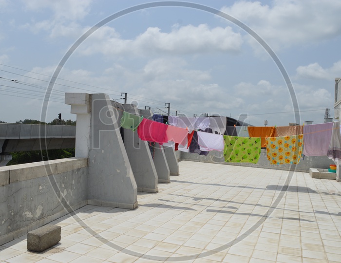 Image of Clothes Drying on House Terrace-YX762204-Picxy