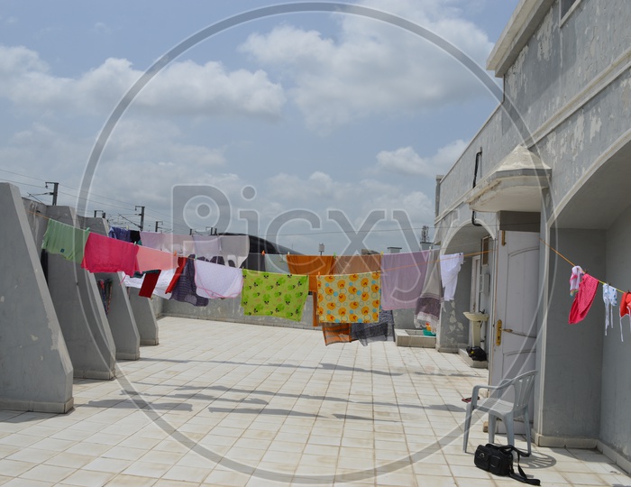 Image of Clothes Drying on House Terrace-YX762204-Picxy