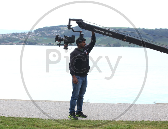 Image of Trolley Camera Or Jimmy Camera In a Movie Shooting-UH519941-Picxy