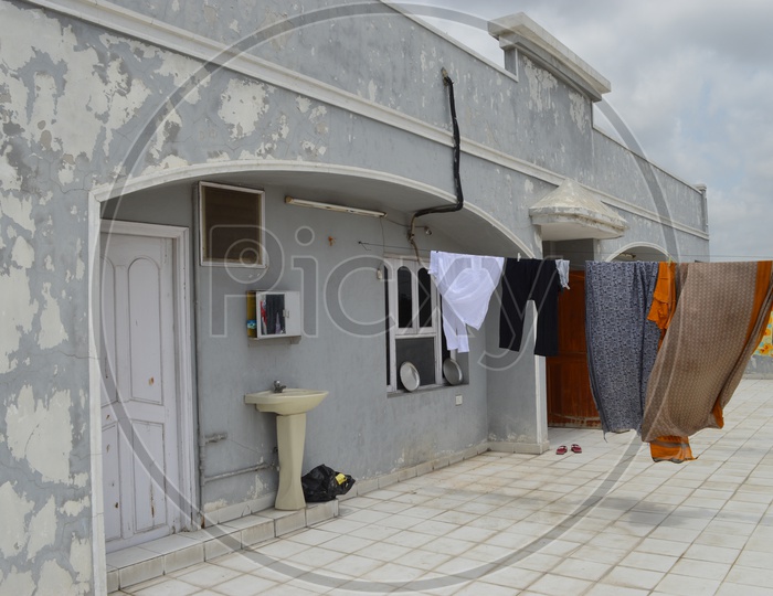 Image of Clothes Drying on House Terrace-DA772069-Picxy