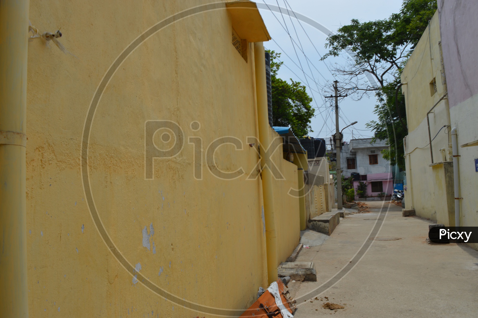 Image of Street With Houses in a Residential Colony-HT300284-Picxy