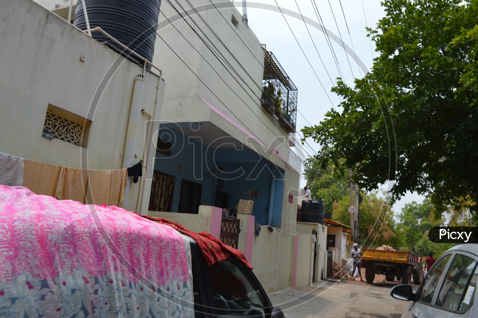 Image of Street With Houses in a Residential Colony-UW335903-Picxy
