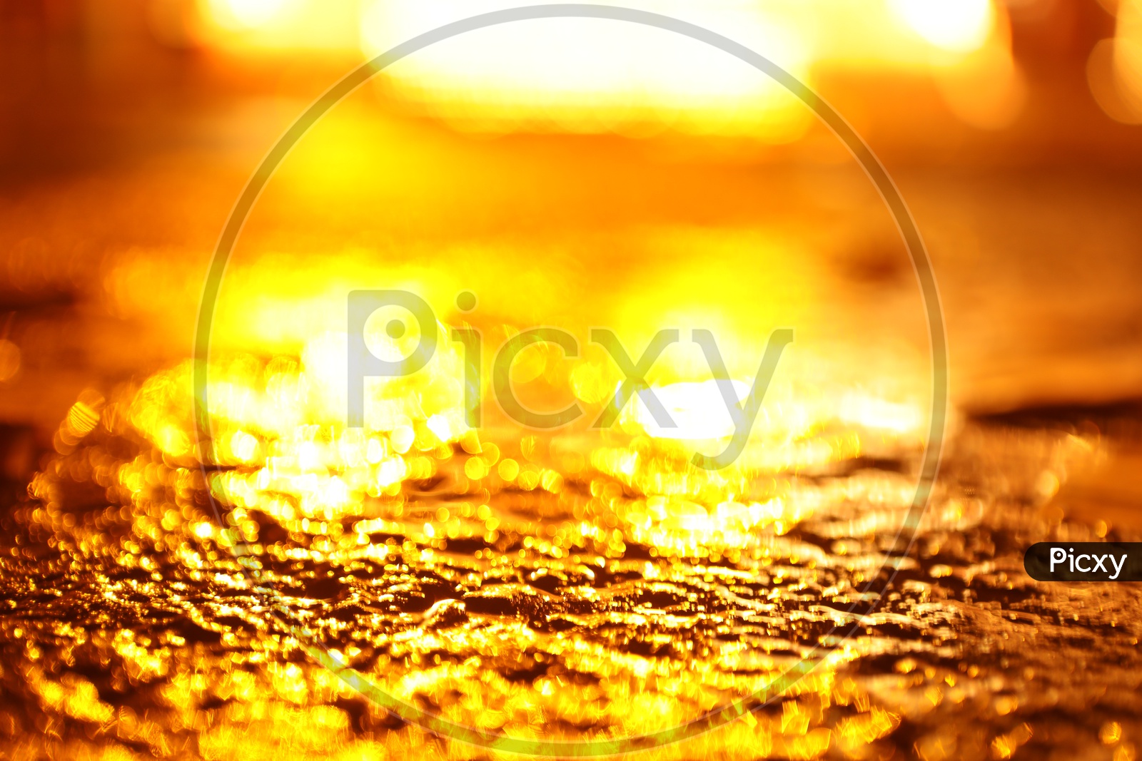 Image of Luminous Golden Yellow Light Over A Surface-YO811697-Picxy