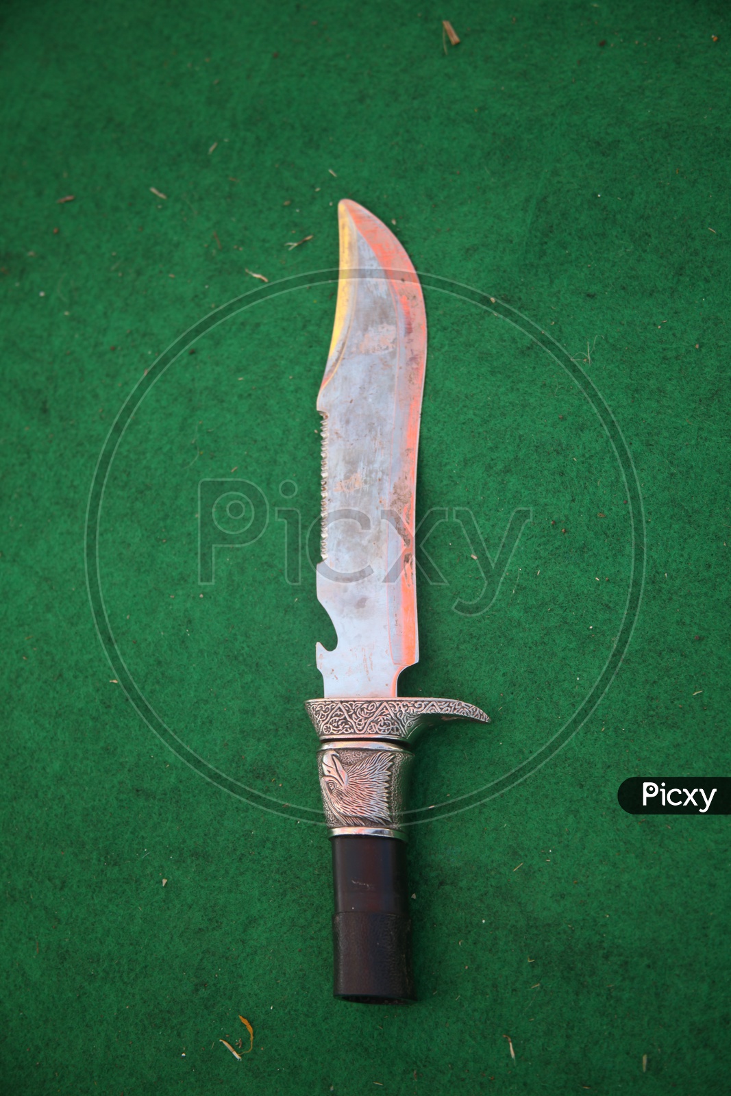 Image of Designed Knife Chaku on an Isolated Green isolated Background ...