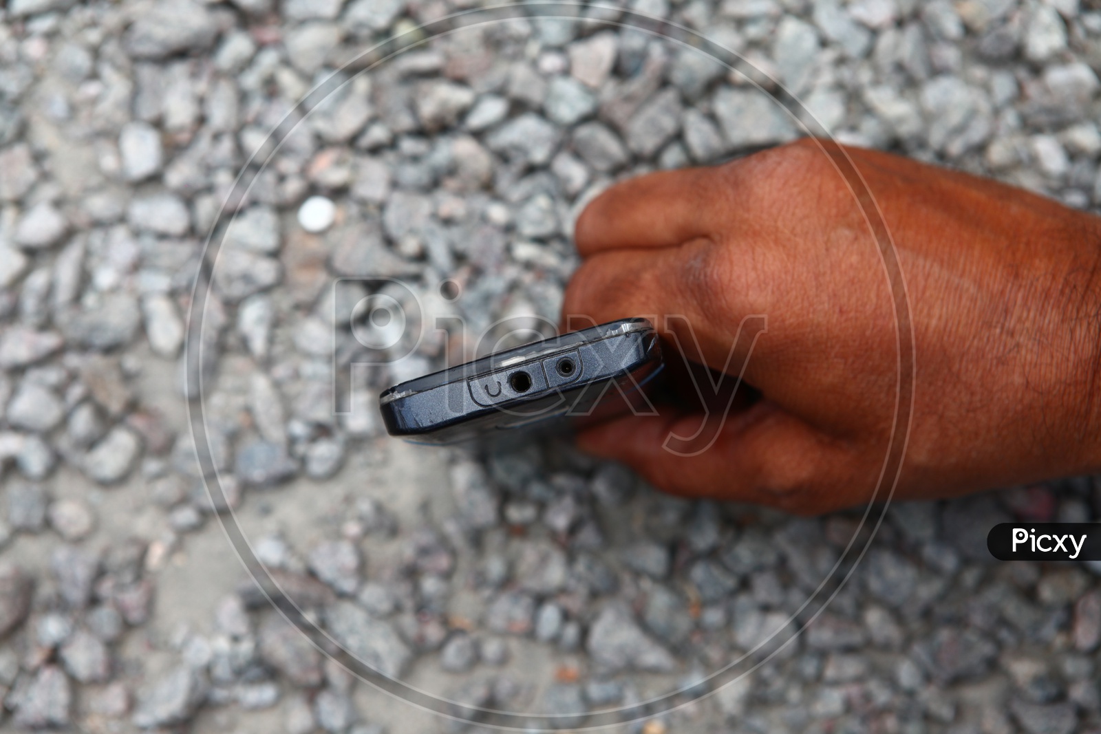 Image of Mobile Phone Collecting From Ground-JX482120-Picxy