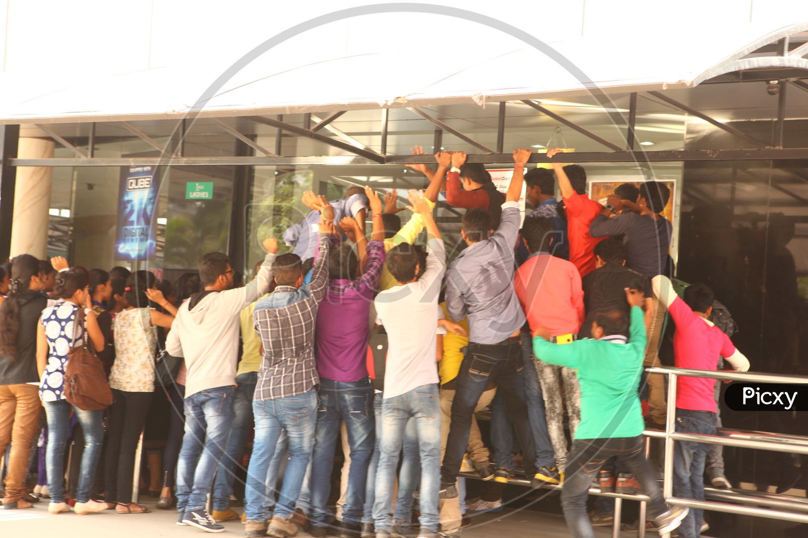 Image of Crowd At Theater ticket Counter Box Office Ambush-DL150236-Picxy