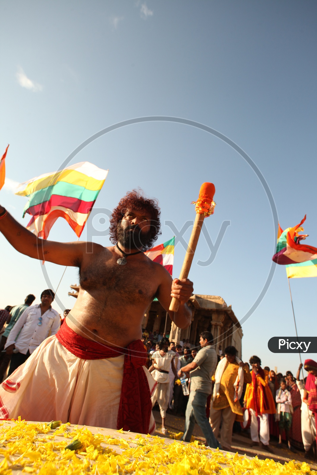 Image of A Man Playing The traditional Drum Damarukam in a Local ...