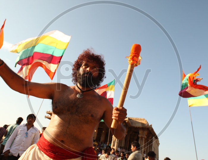 Image of A Man Playing The traditional Drum Damarukam in a Local ...