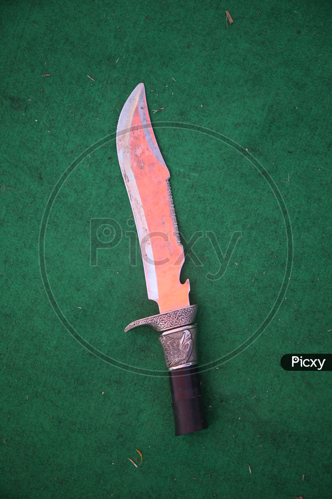 Image of Designed Knife Chaku on an Isolated Green isolated Background ...