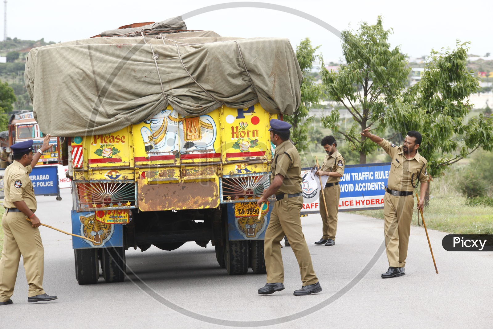 Image of Police Man Checking Trucks lorries with Barricades at Highway ...