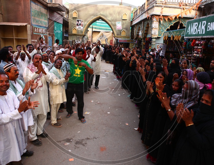 Image of Muslim Man And Woman Cheering-GW719715-Picxy