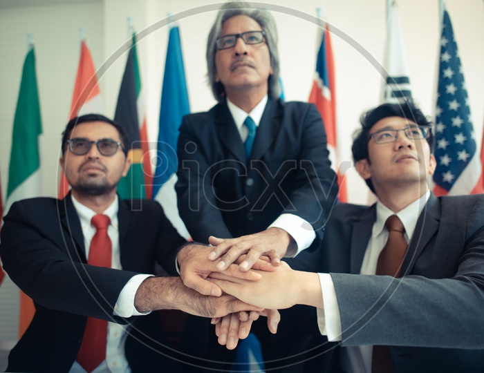 Image of Business Men taking oath during a meeting-BY654046-Picxy