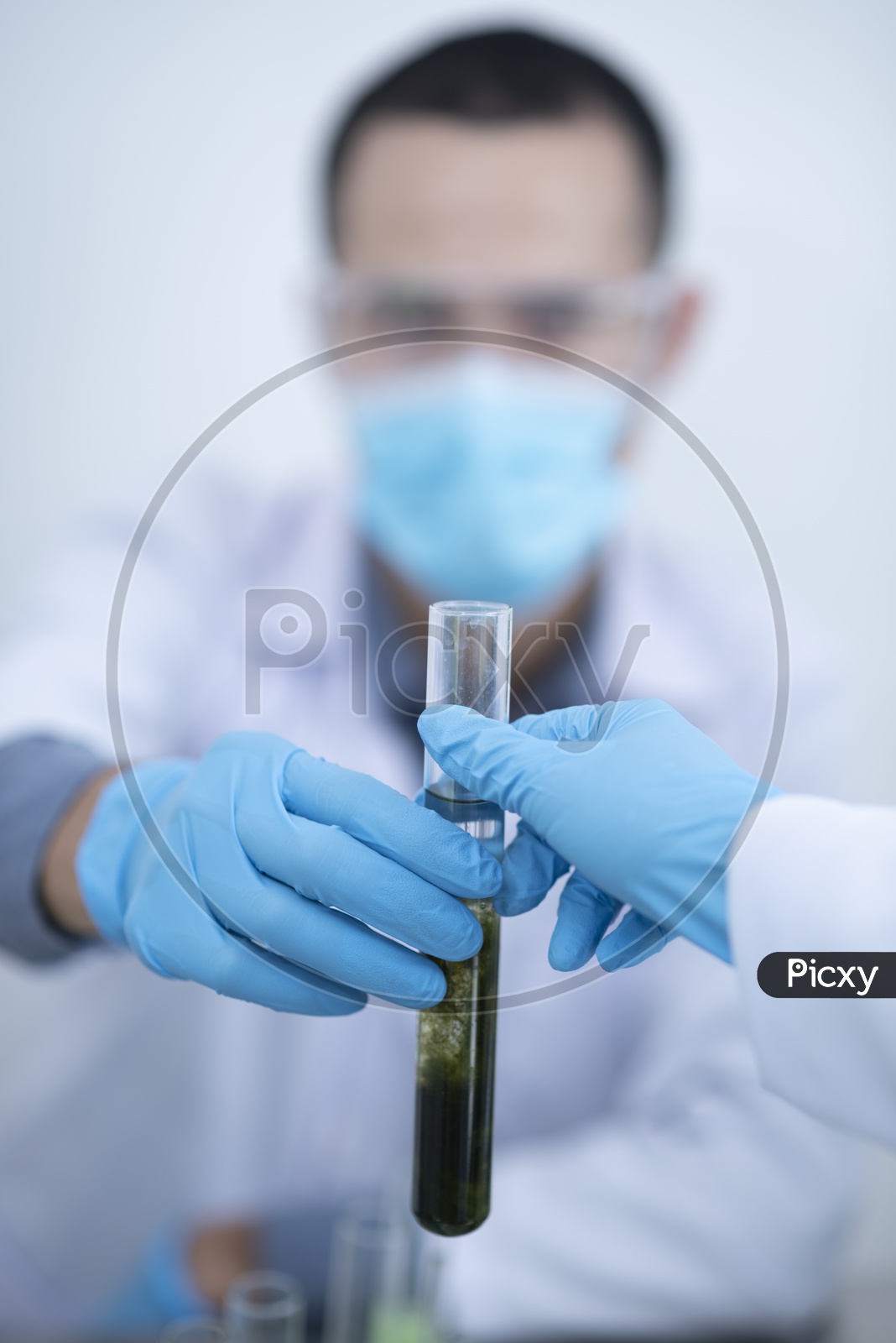 Image of scientist testing his experiment in a science laboratory ...