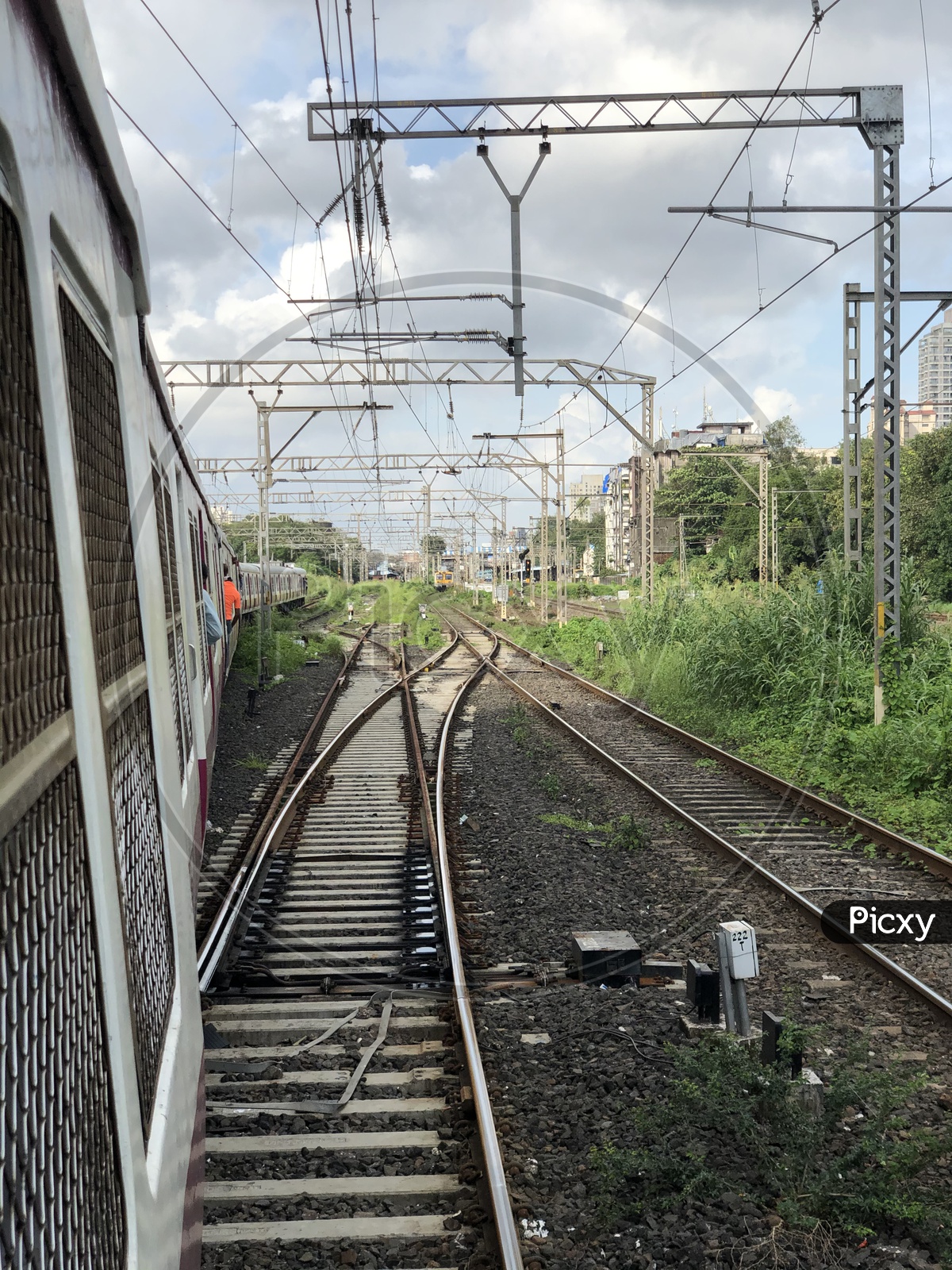 Image of Mumbai Suburban Trains Running On tracks in Mumbai-UT114679-Picxy