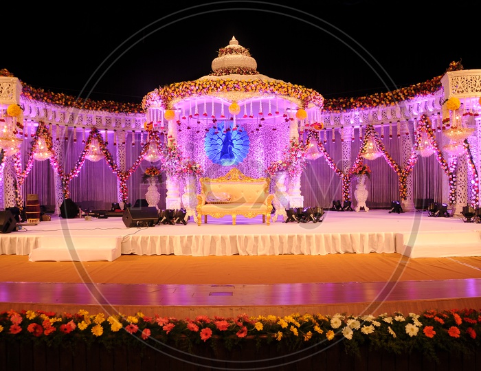 Image of Mulitcoloured night lights decorated outdoor wedding stage ...