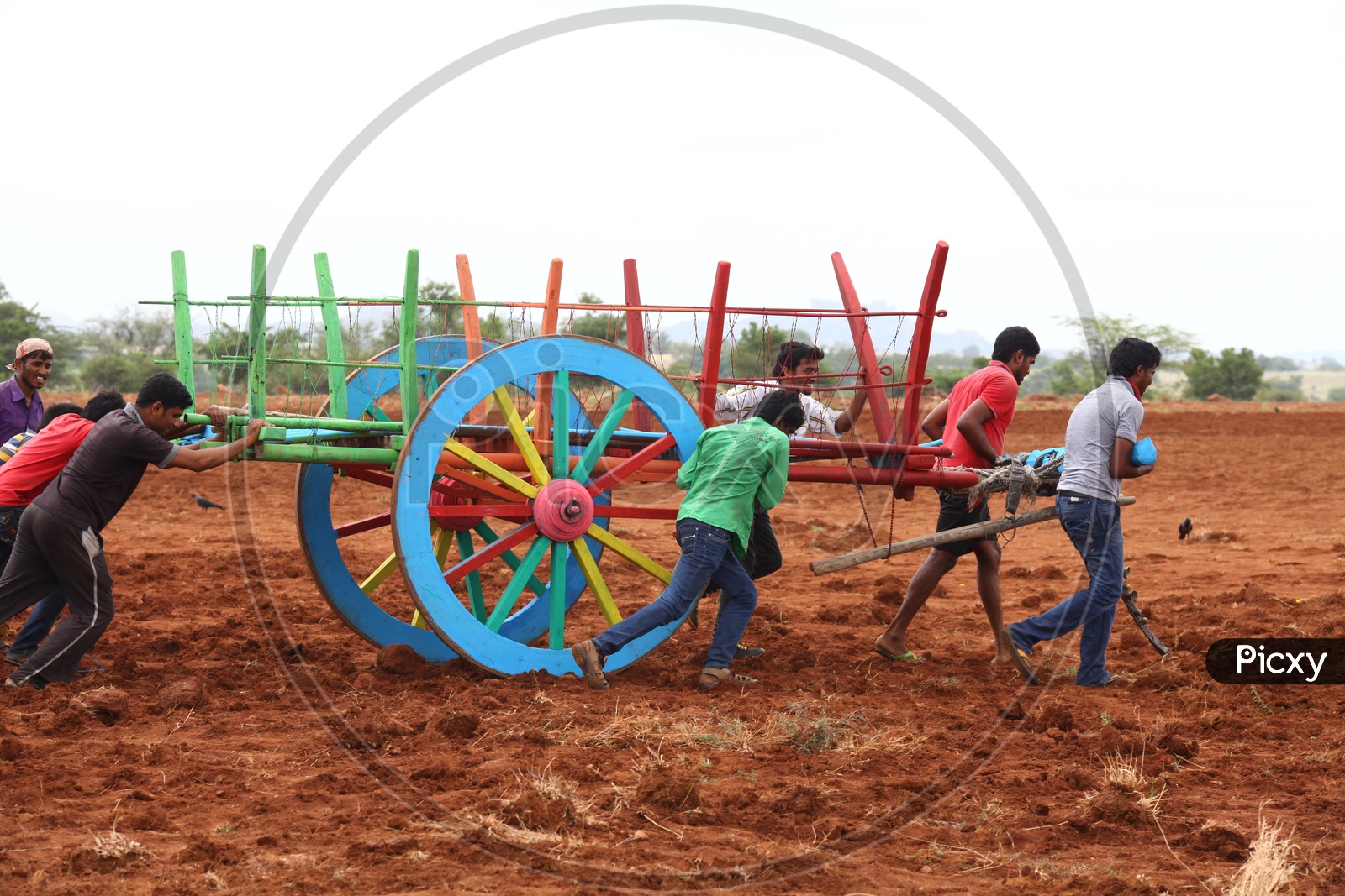 Image of Indian Men pulling the wagon-MB169364-Picxy