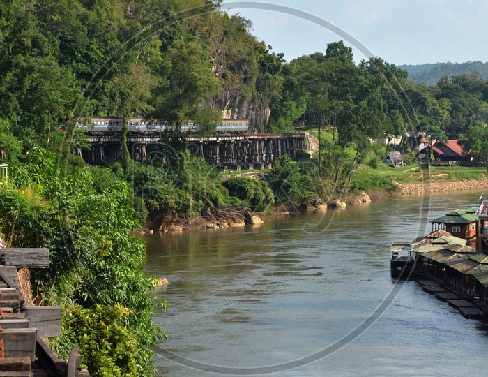 Image of Water Channel Flowing with Floating houses-WR030282-Picxy