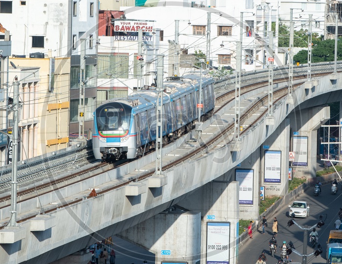 Image of Metro train Running On Track Top View With Commuting Vehicles ...