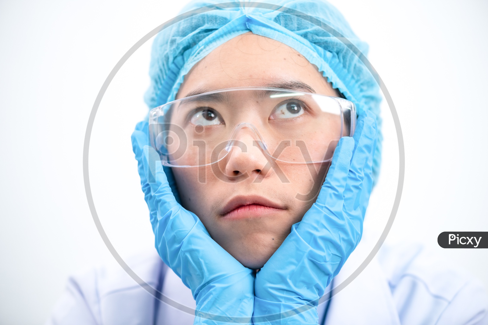 Image of Young Asian Female Scientist Thinking-WX858253-Picxy