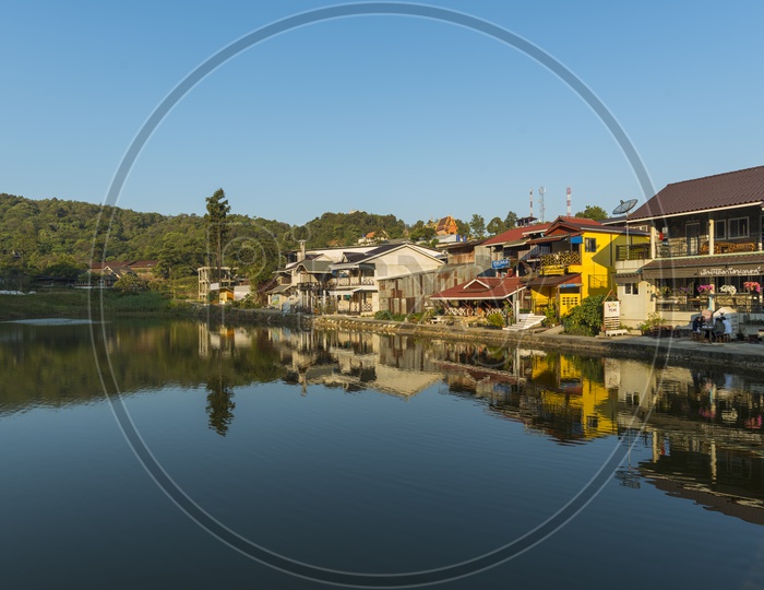 Image of Pilok Village with Houses on lake Bank-OO042531-Picxy