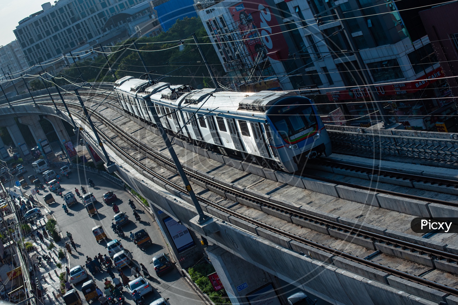 Image of Top View Of a Hyderabad Metro Train Moving On Track With a ...