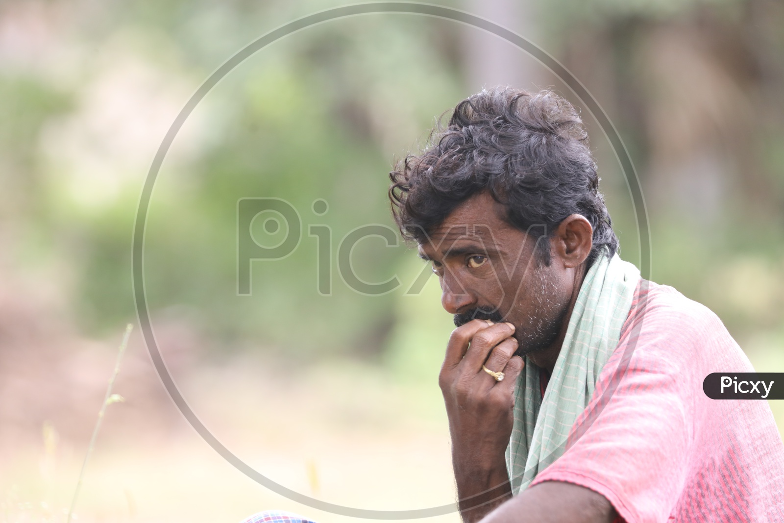 Image of Indian Man teeth picking-OL189116-Picxy