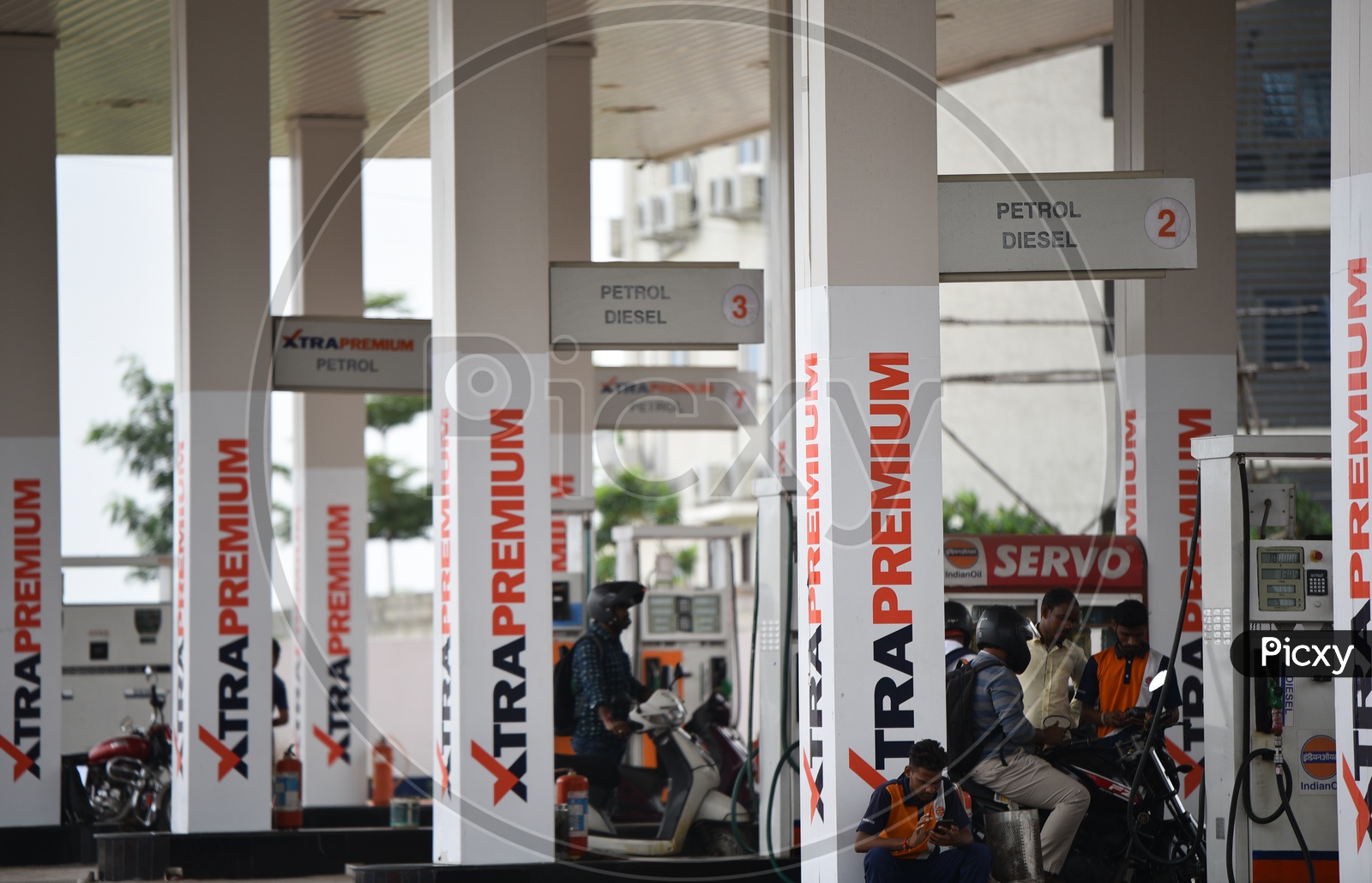 Image of Petrol Bunk or Fuel Station With vehicles Filling Fuel ...