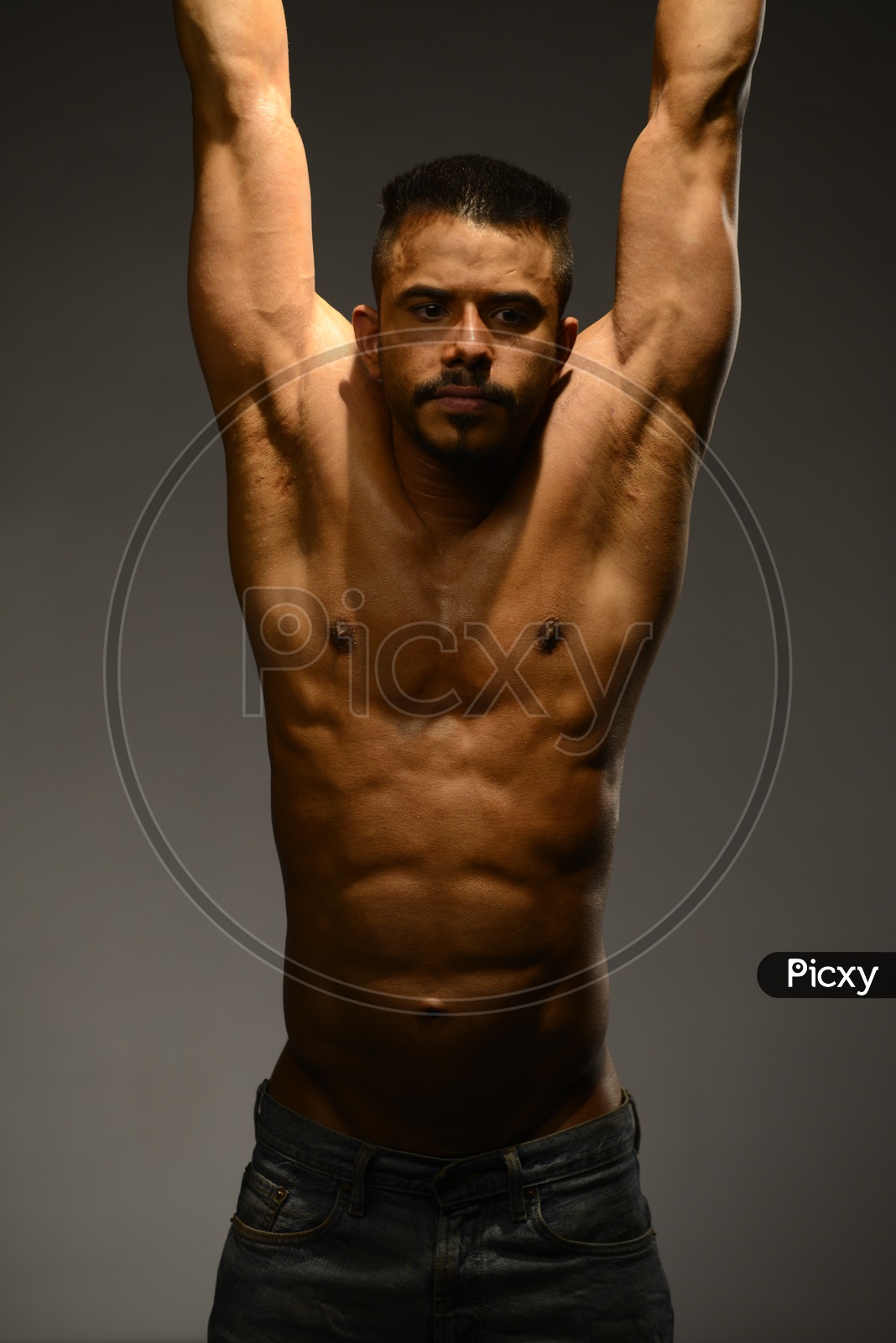 Image of Indian Muscular man with six pack abs-XT006385-Picxy