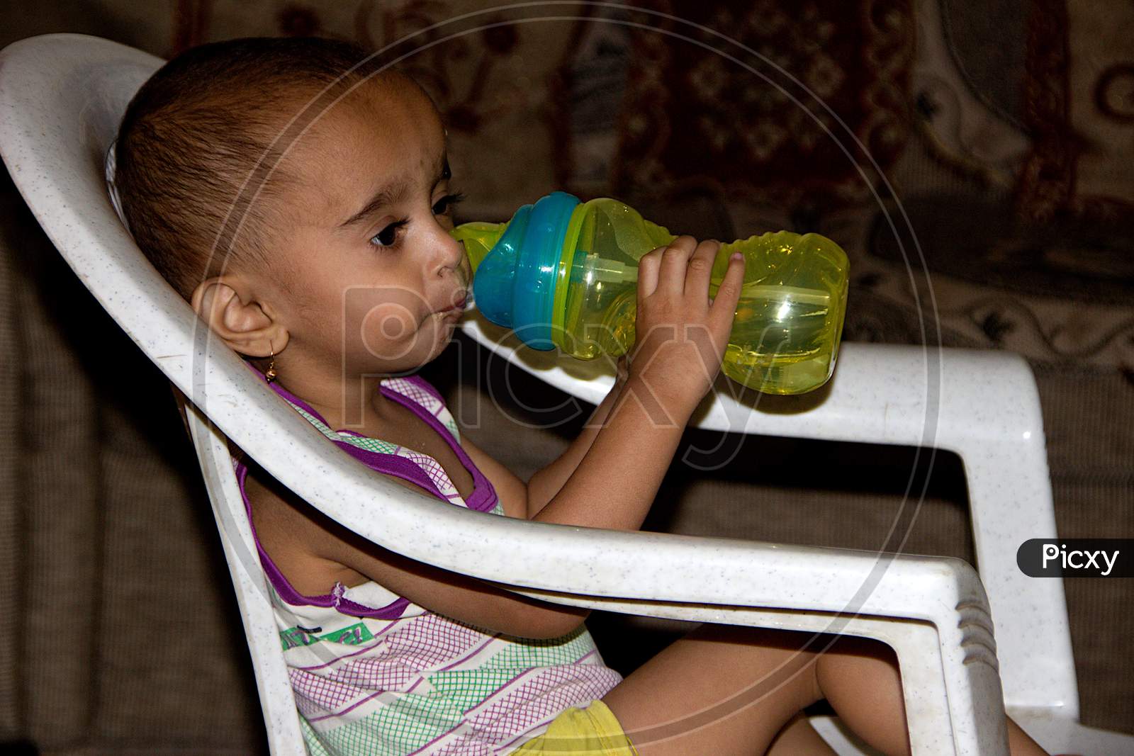 Image of Small Boy Enjoying Sip Of Water-TQ853985-Picxy