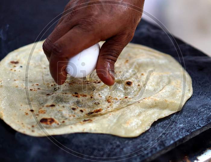 Image of Making Indian Street Food Flat Bread Or Chapathi ,Frying On ...