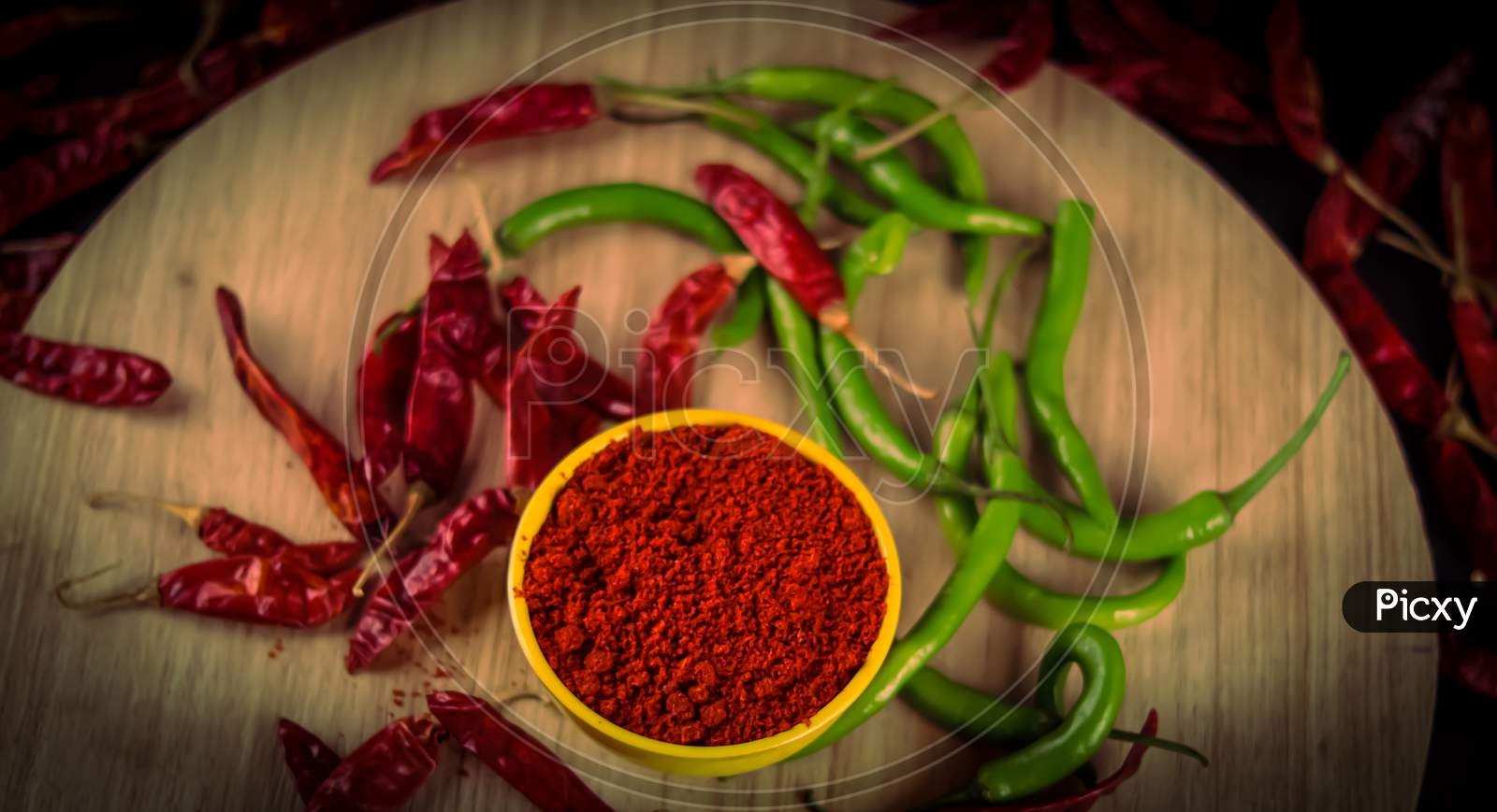 Image of There Are Dried Chillies And Blue And Red Chillies On The ...
