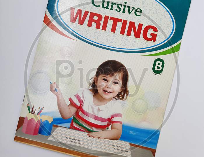 Image of Closeup Of English And Kannada Copy Book, Cursive Writing Book ...