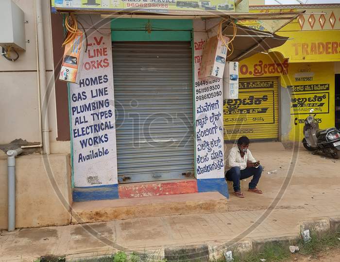 Image of Closeup Of Shutter Closed Small Indian Home Appliances Shop On ...