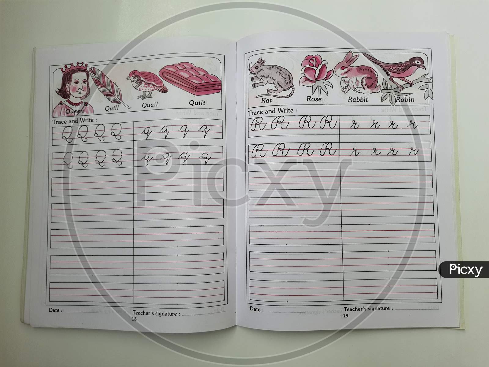 Image of Closeup Of English And Kannada Copy Book, Cursive Writing ...