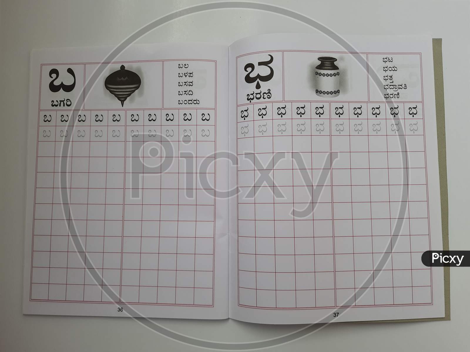 Image Of Closeup Of English And Kannada Copy Book Cursive Writing Image Of Closeup Of English And Kannada Copy Book Cursive Writing