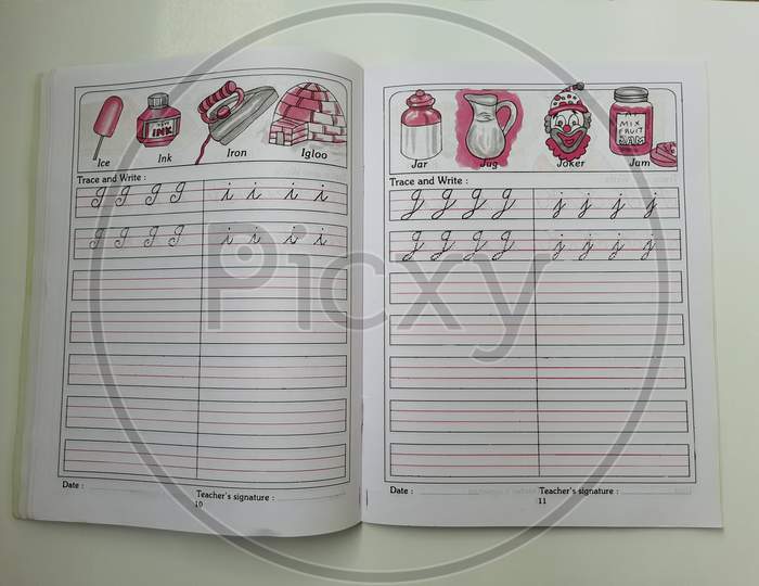 Image of Closeup Of English And Kannada Copy Book, Cursive Writing ...