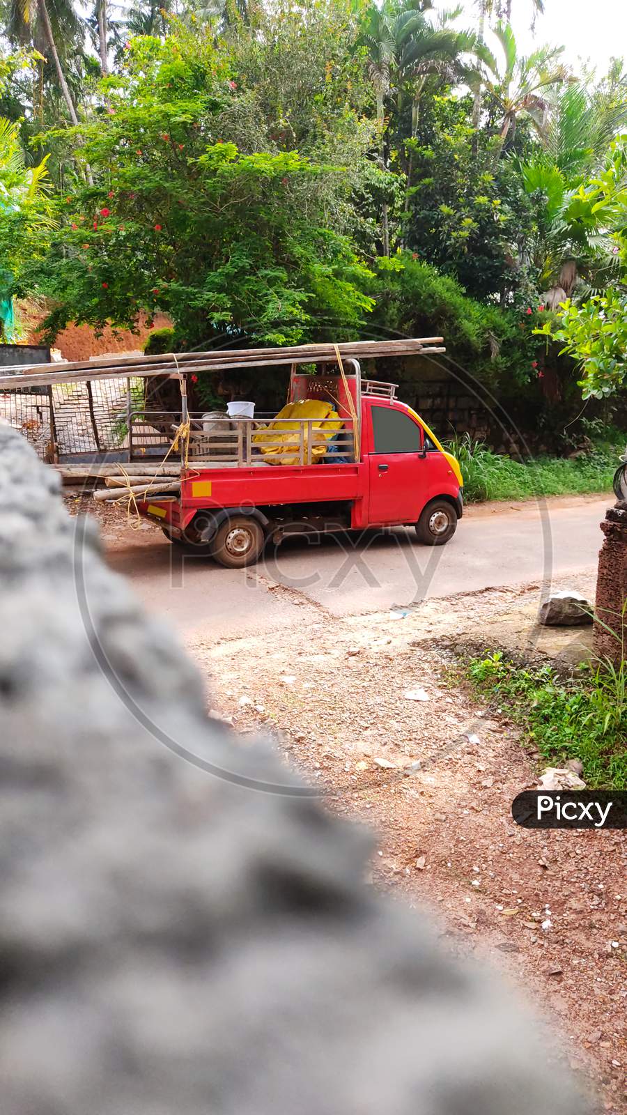 Image of A Goods Carrying Vehicle On Road-OE873943-Picxy