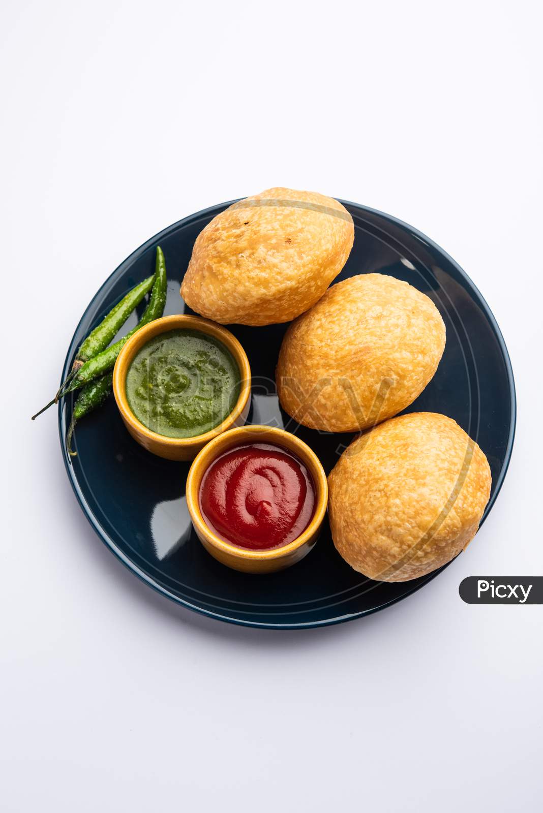Image of Kachori Is A Flat Spicy Snack From India Also Spelled As ...