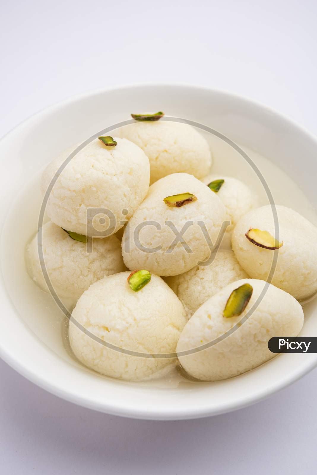 Image of Rasgulla Or Rosogulla - An Indian Sweet Made From Khoya, Soft ...