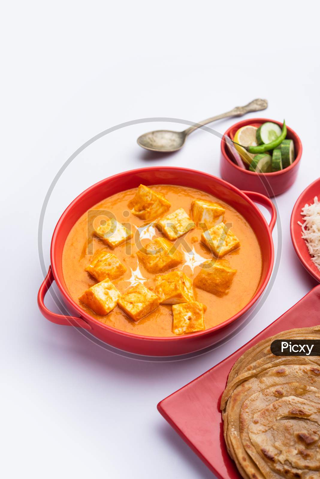 Image of Paneer Butter Masala Or Cheese Cottage Curry Served With Rice ...