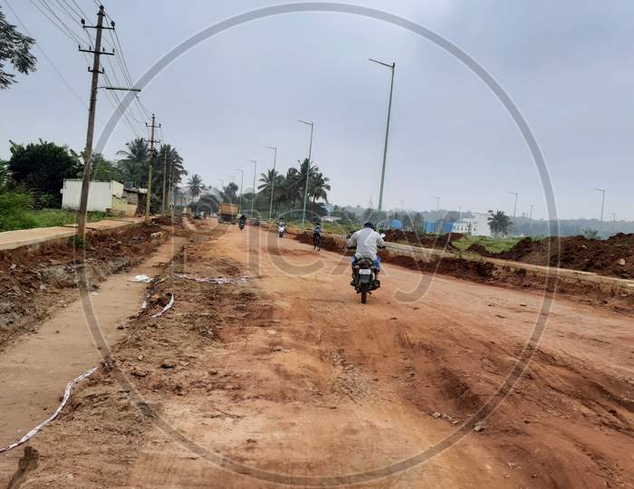 Image of Closeup Of Working In Road Construction Work In Kadabagere ...
