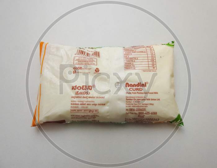 Image of Closeup Of Kmf Nandini Curd 250Ml Yellow And White Color Pack ...