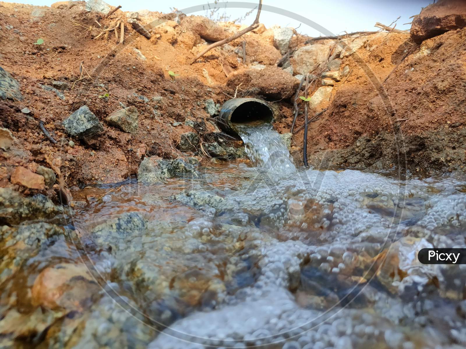 Image of water filling in farming land to wet. underground water ...