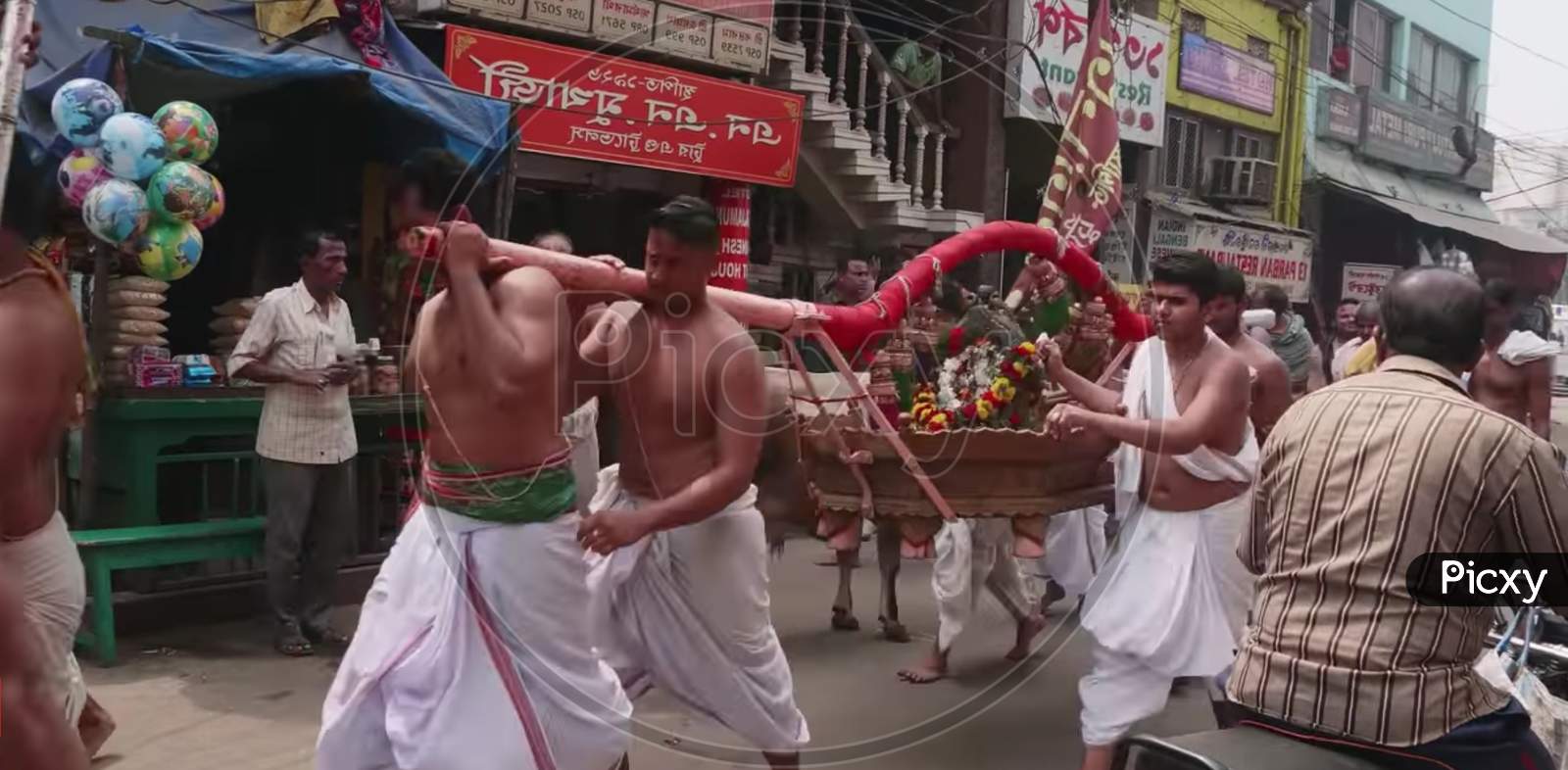 Image of famous rituals performing on road in south India-XV345408-Picxy