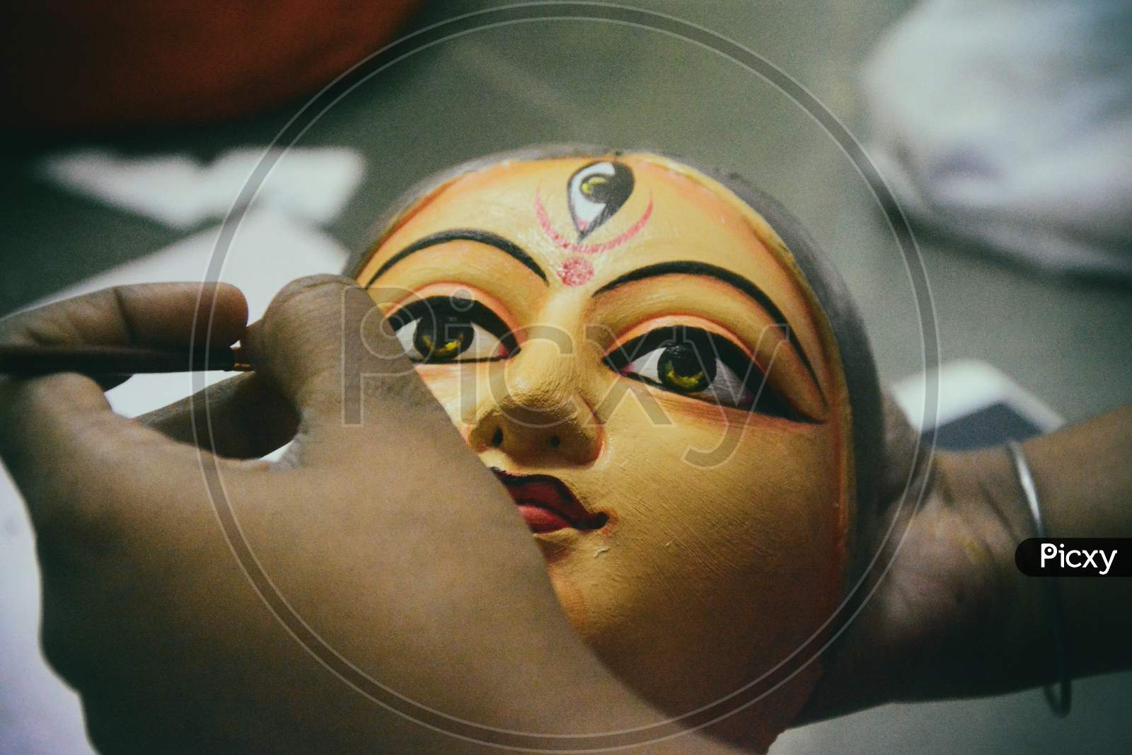 Image of Person doing handcraft face mask-SD512396-Picxy