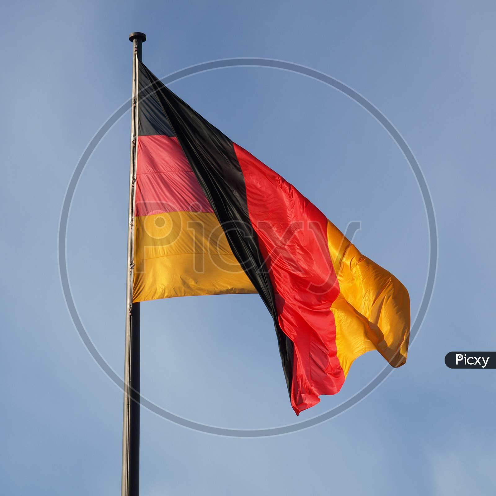 Image of German Flag Over Blue Sky-BX966657-Picxy