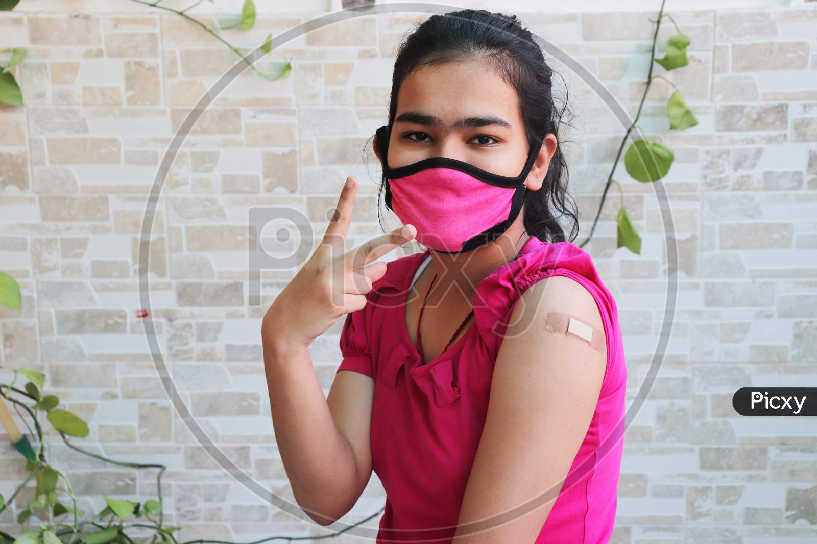 Image of Indian Man Do Victory Sign After Getting Vaccination During ...