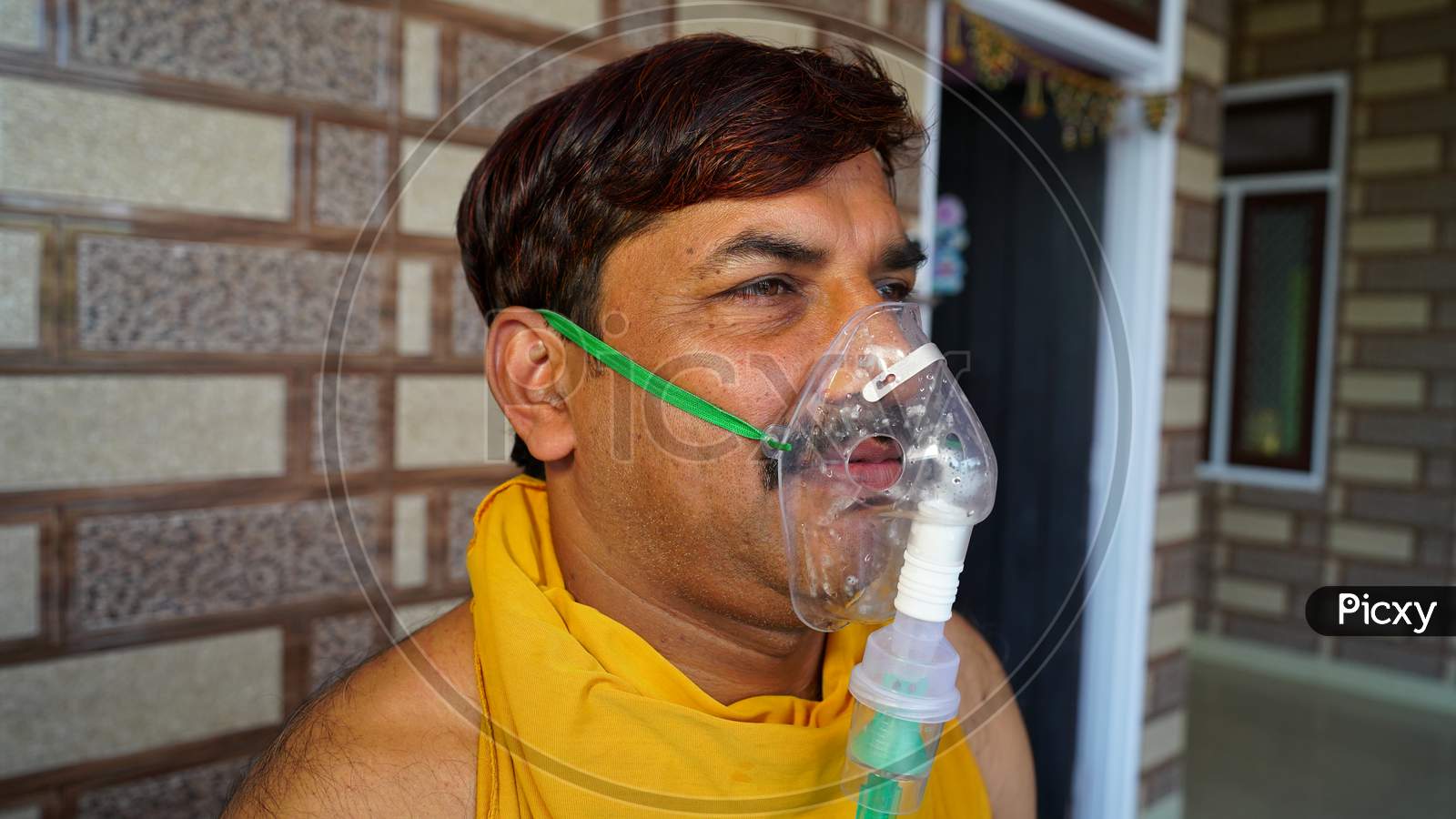 Image of Indian Man Infected With Covid 19 Disease. Patient Inhaling ...