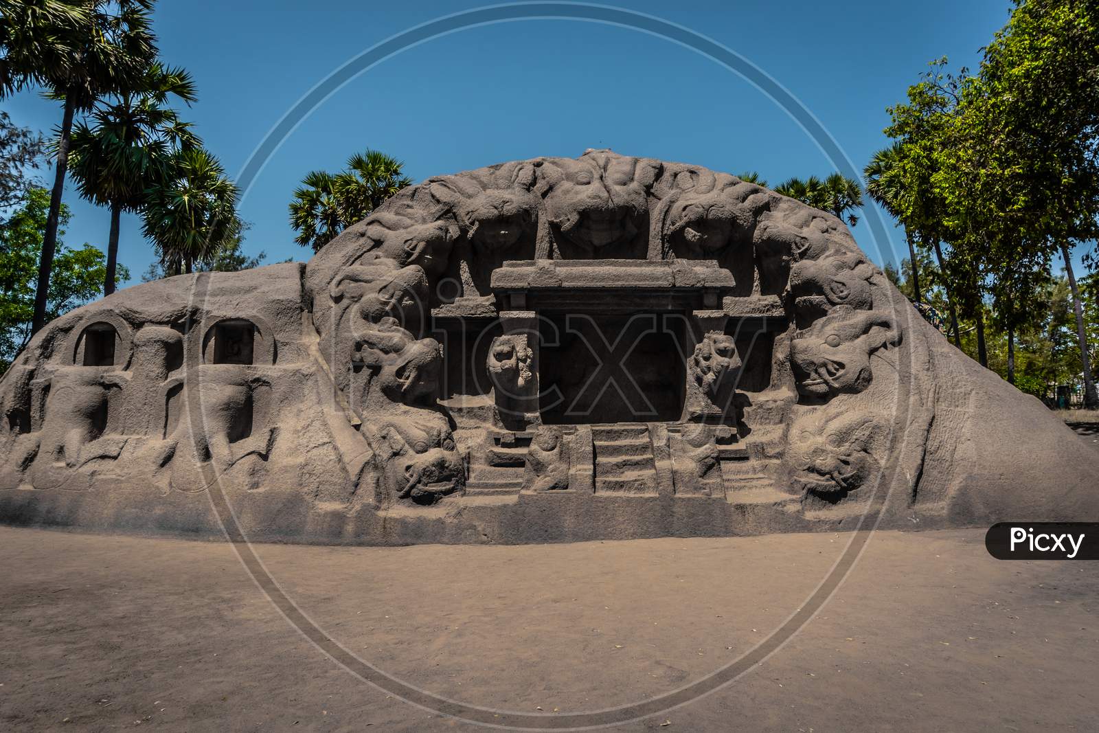 Image of The Tiger Cave Temple- carvings of tiger heads on the mouth of ...